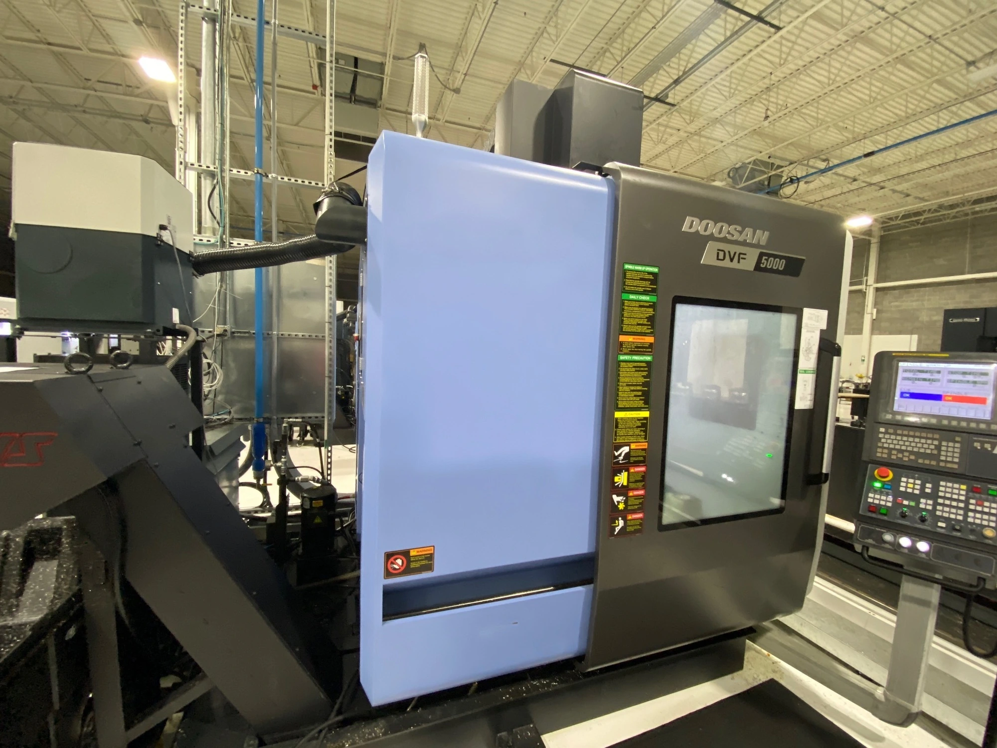 Used 2021 DOOSAN DVF 5000 CNC 5 Axis Machines 9889 | USED CNC WAREHOUSE